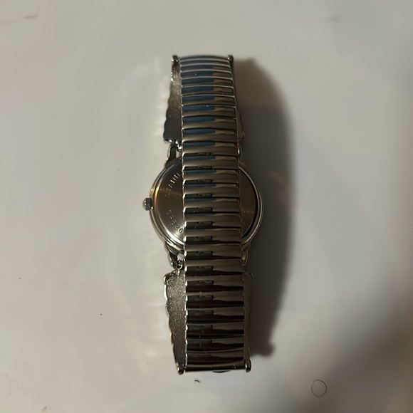 Avon | Accessories | Avon And Quartz Womens Watch Silver With Designs ...
